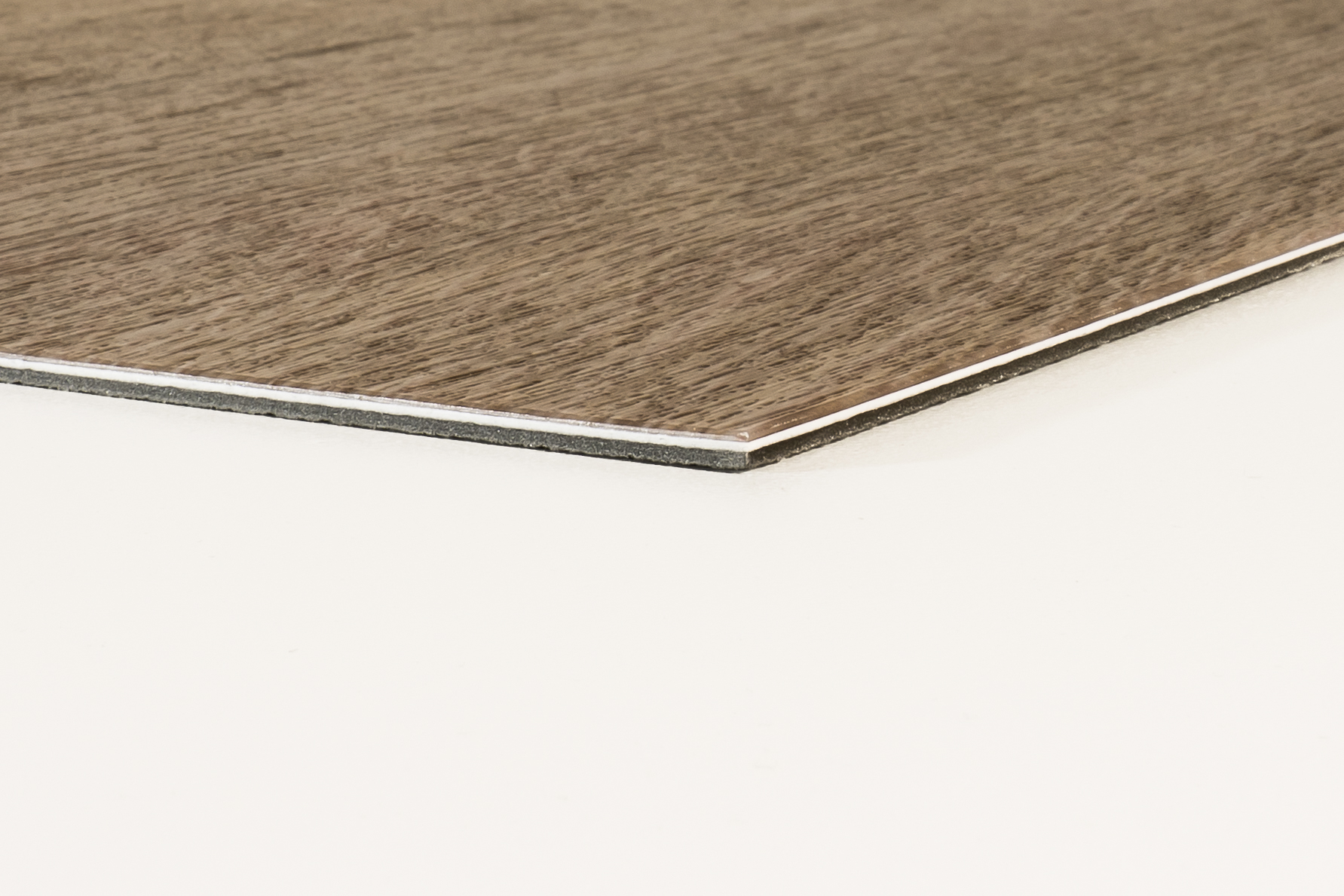 Laminating composite panels and flooring